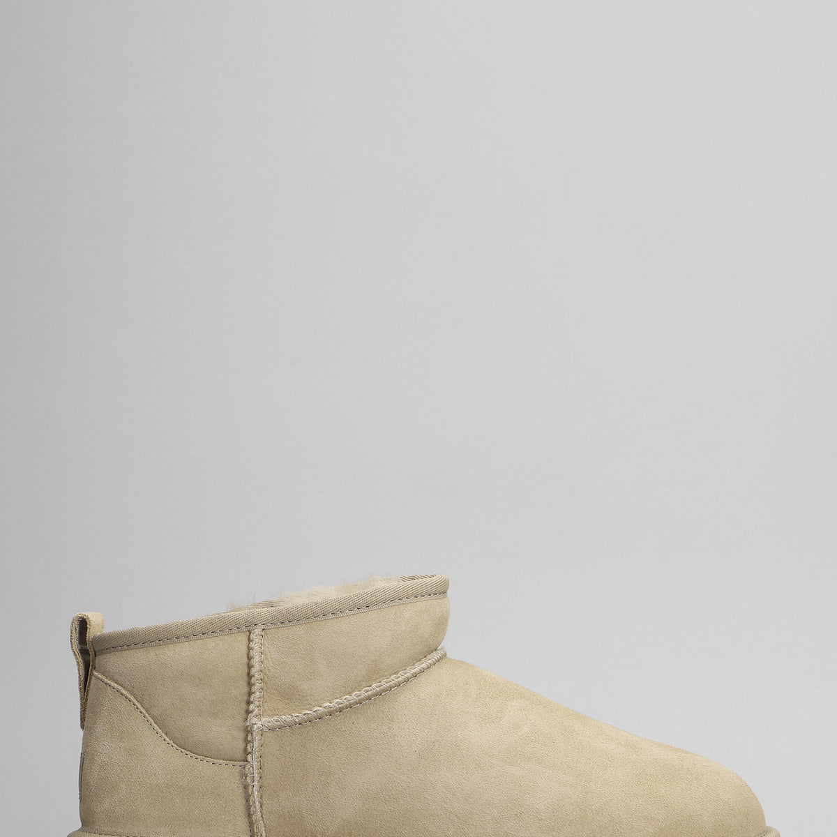 Classic Ultra Mini low heels Ankle boots in beige suede – Deliberti